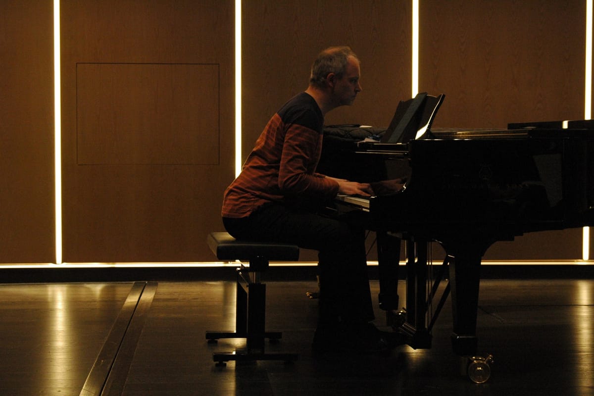 At TU Dublin’s recital hall, a group of artists performs the city’s ...